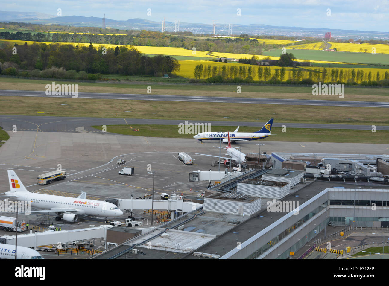 A Ryanair B737, Iberia Express A320 and a Virgin Atlantic A320 on the ...