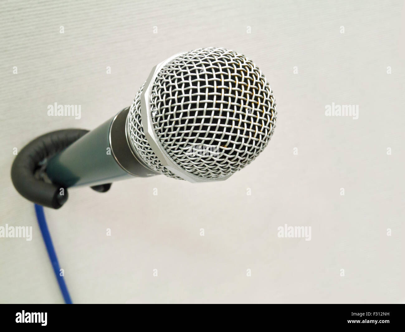microphone on wall Stock Photo - Alamy