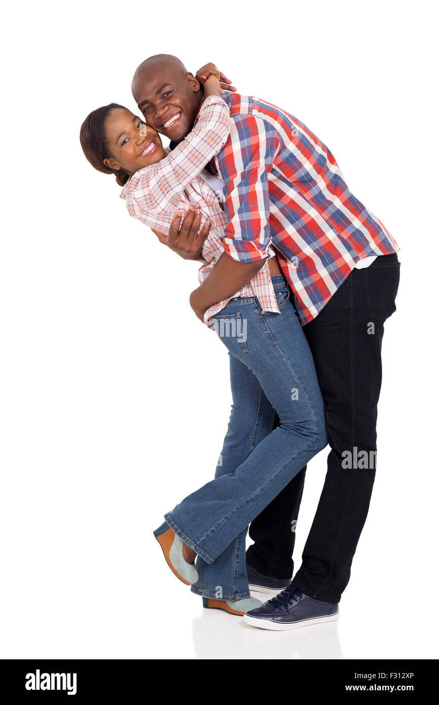 cheerful afro American couple hugging isolated on white background ...