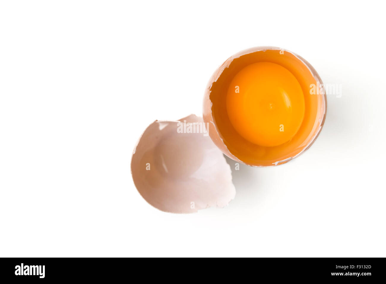 egg yolk on white background Stock Photo - Alamy