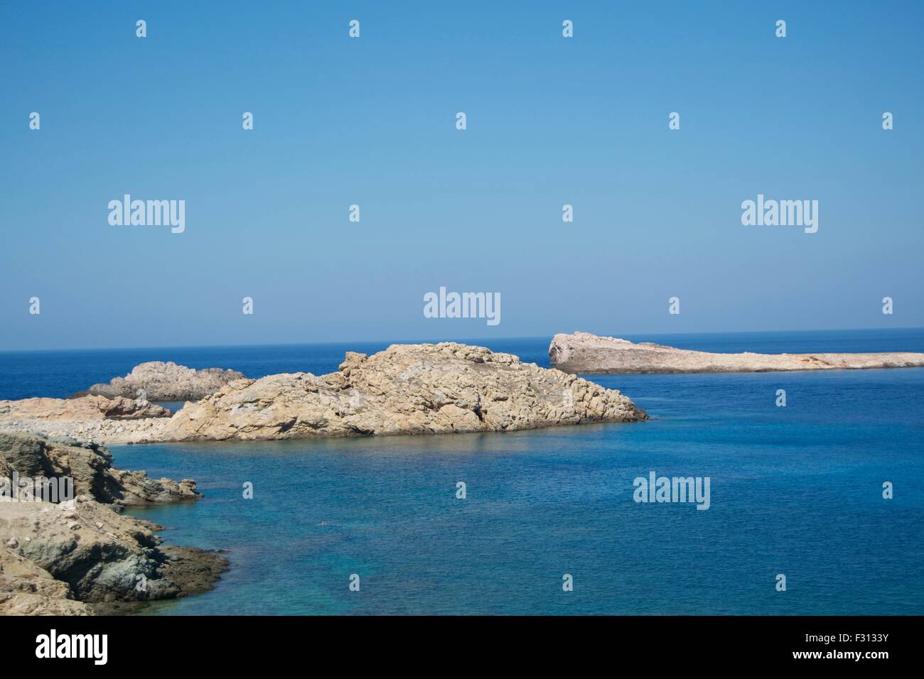 Greek island clear blue water Mykonos travel sea Stock Photo - Alamy