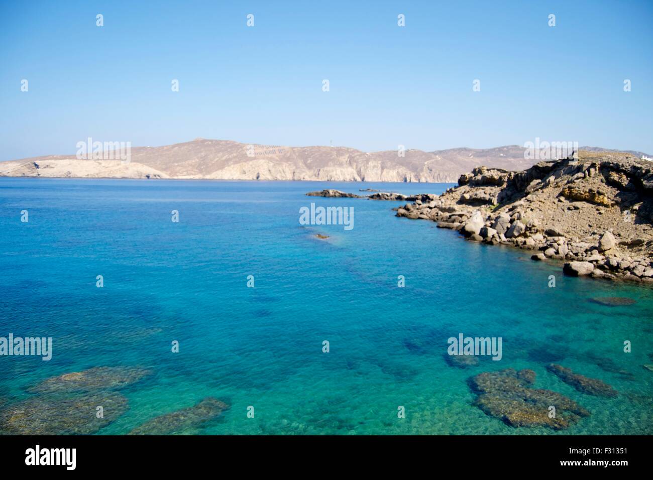 Beach Mykonos Greek island blue clear water shore Stock Photo - Alamy