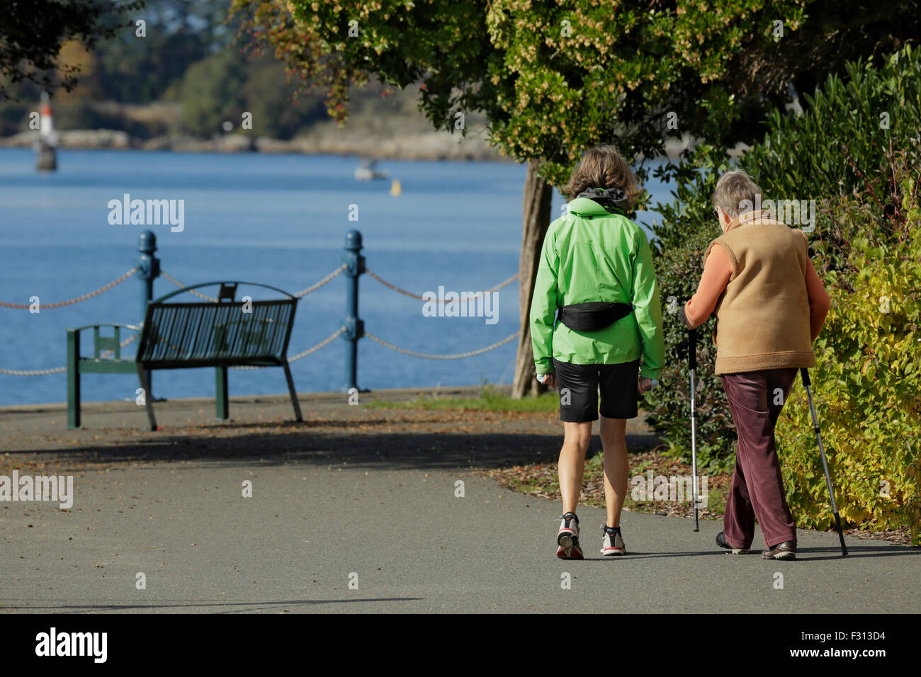 Mother and daughter enjoying fall walk at Westbay Walkway-Victoria ...