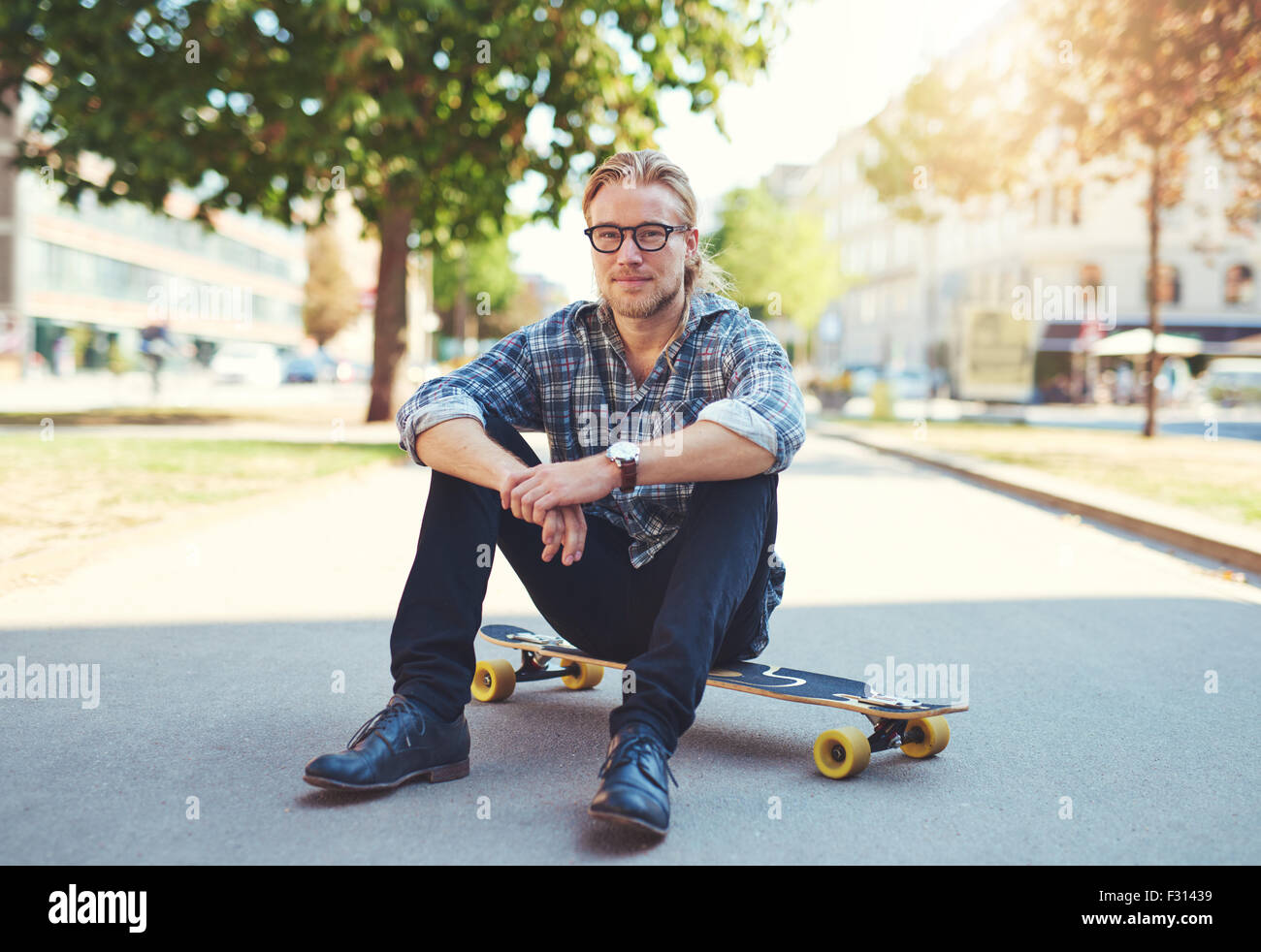 Outdoor portrait of modern young man in the street Stock Photo - Alamy
