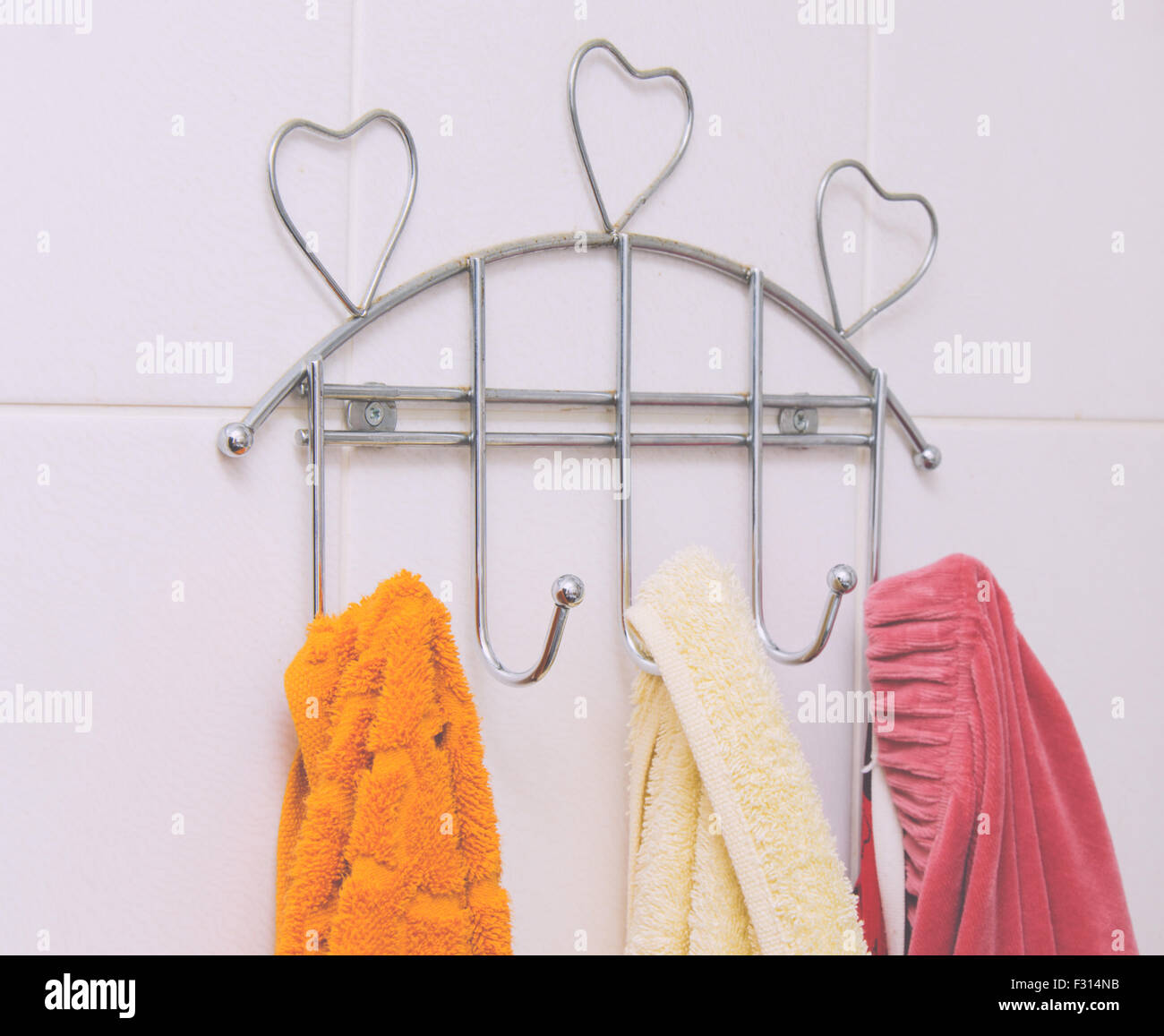 Color textile towels in the home bathroom Stock Photo - Alamy
