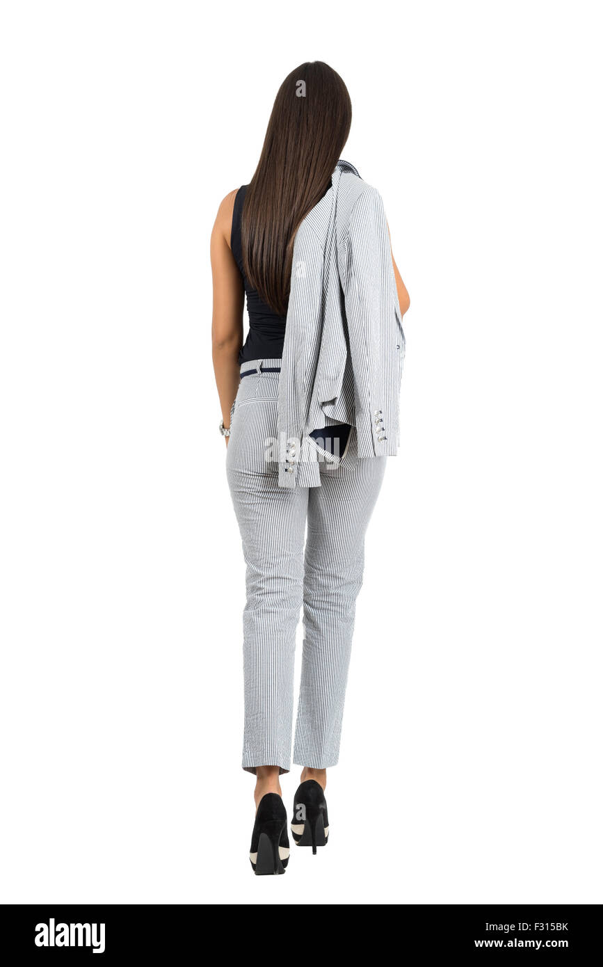 Businesswoman holding jacket over shoulder hi-res stock photography and ...