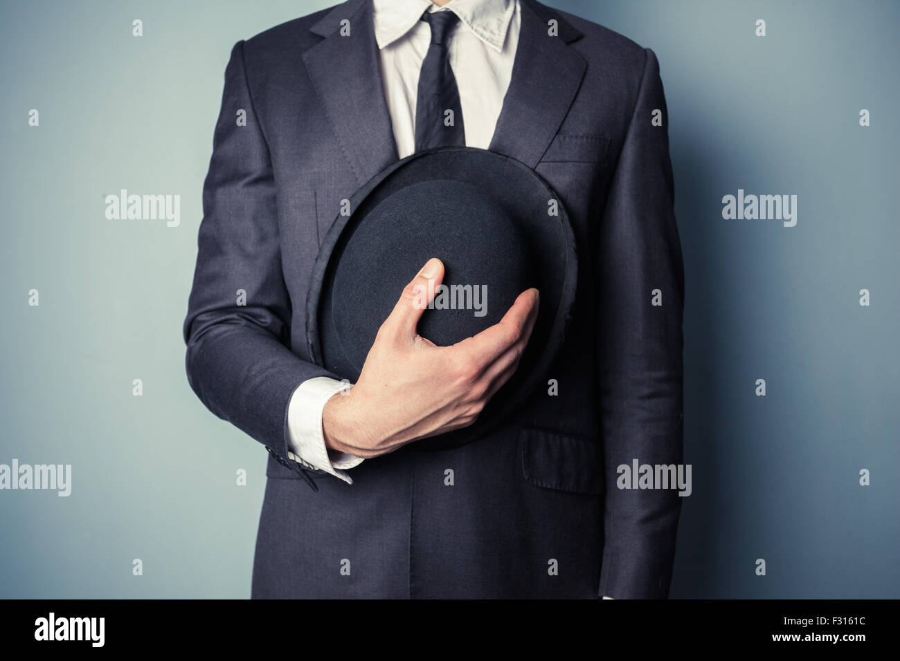 Businessman bowler hat hi-res stock photography and images - Alamy