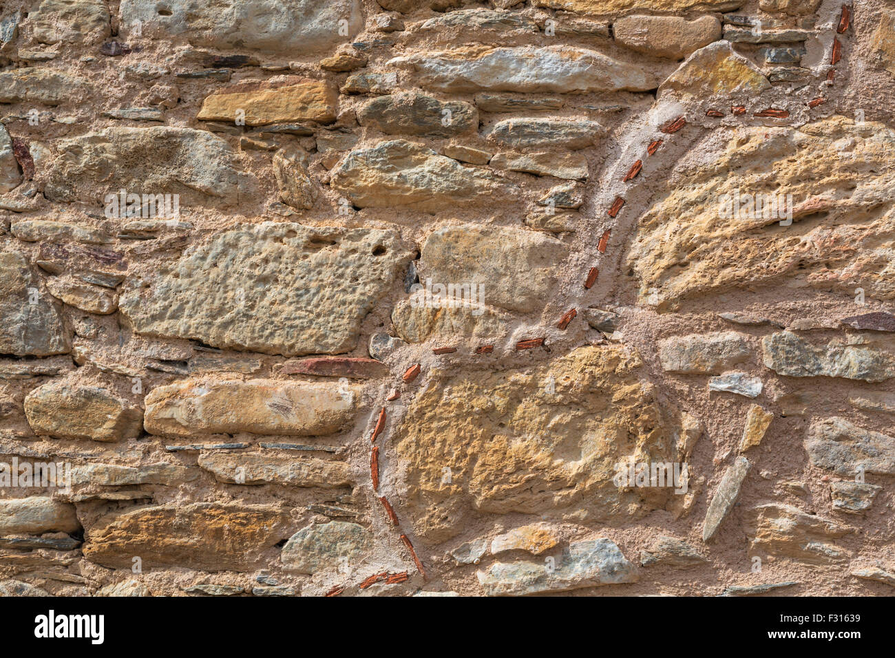 Natural old stone wall texture ancient ruin wall Stock Photo - Alamy