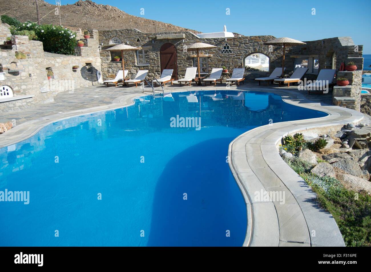 Sea facing resort in Mykonos Stock Photo - Alamy