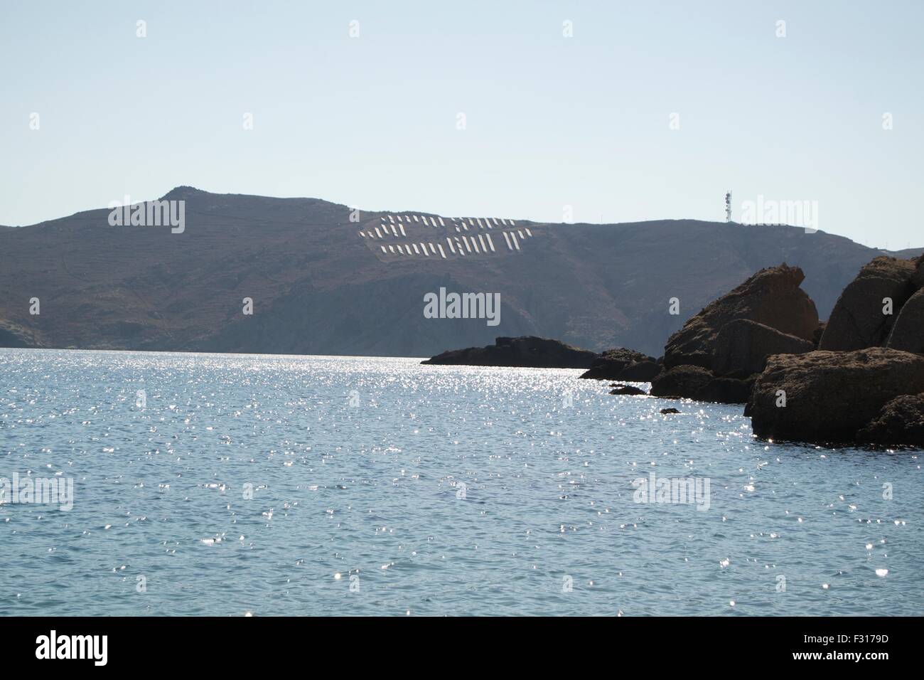 Beach Mykonos Island Greece clear blue sea water Stock Photo - Alamy
