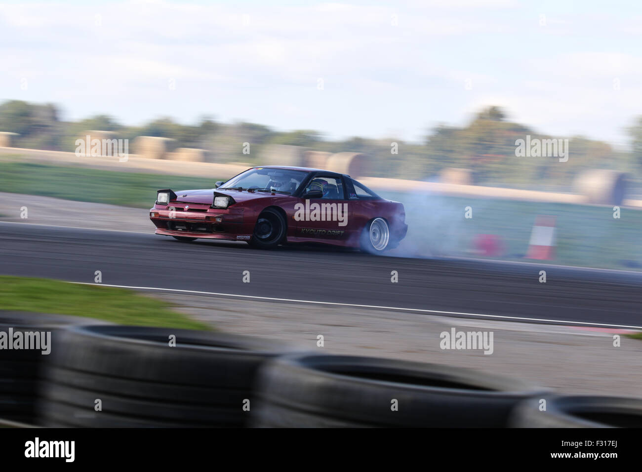 A drift car on track at Castle Combe Circuit Stock Photo - Alamy