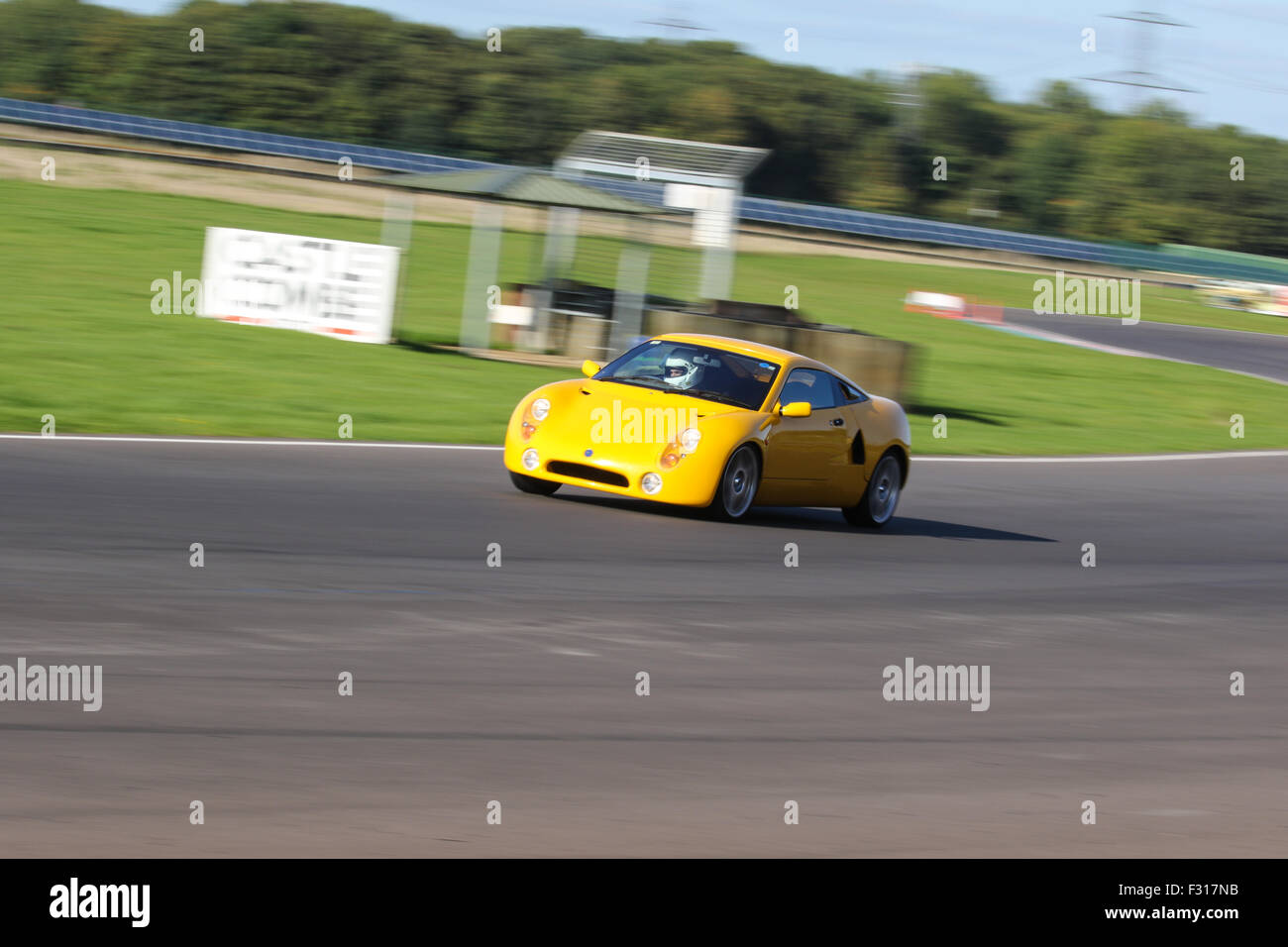 A Mini on track at Castle Combe Circuit's Mini Action Day Stock Photo ...
