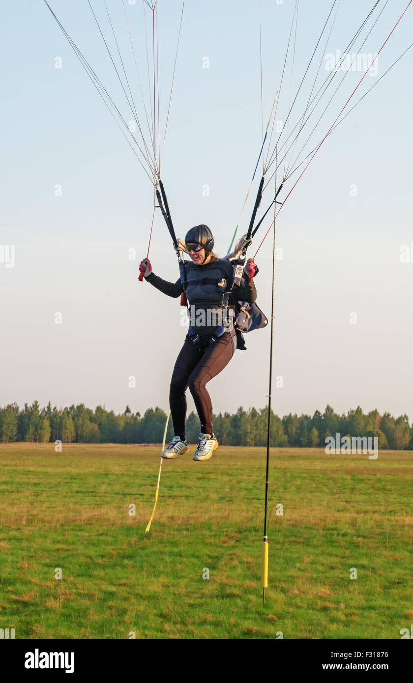 Female parachute jumper landing hi-res stock photography and images - Alamy