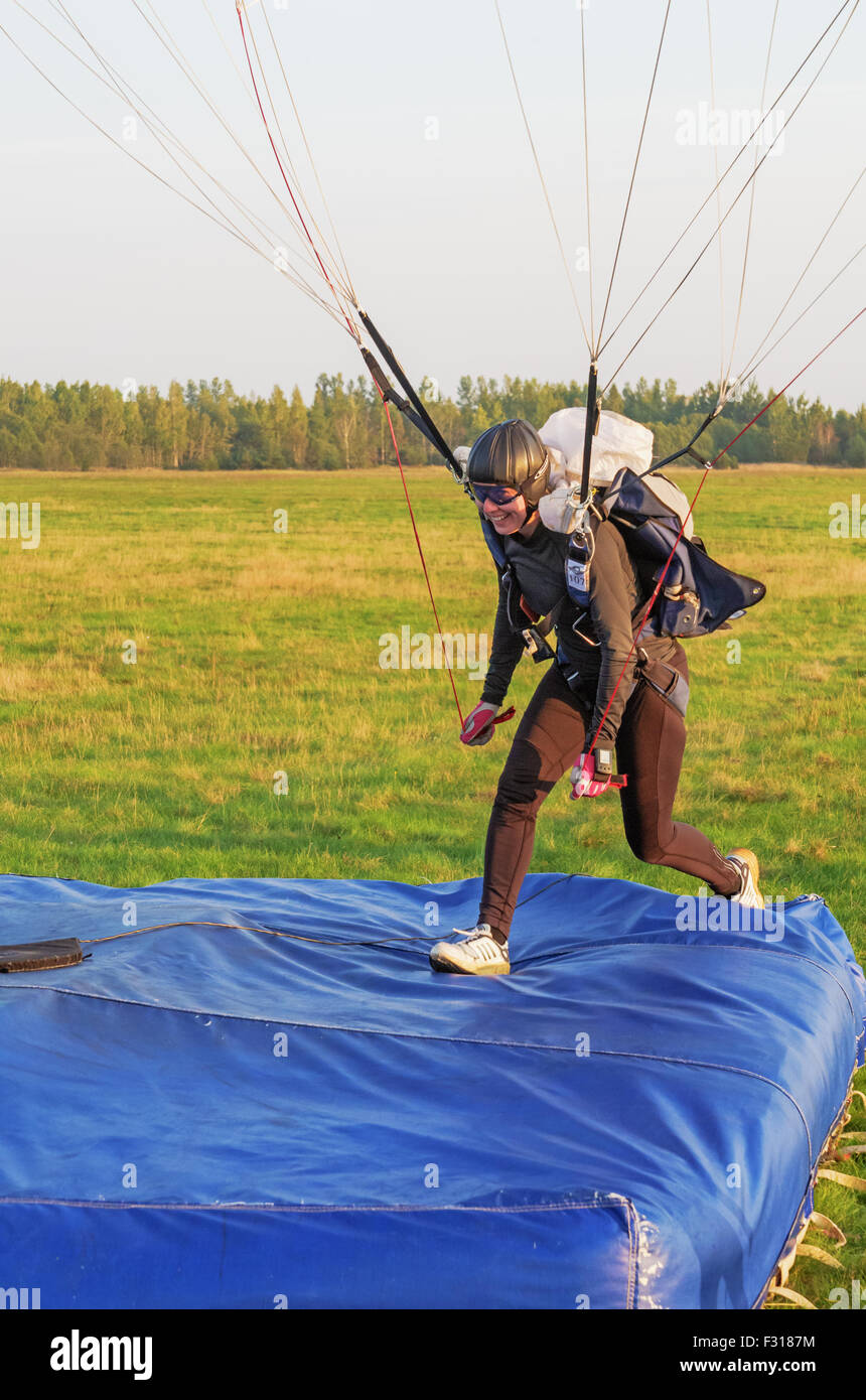 Parachutists - 2014. The skydiver landing under parachute Stock Photo ...