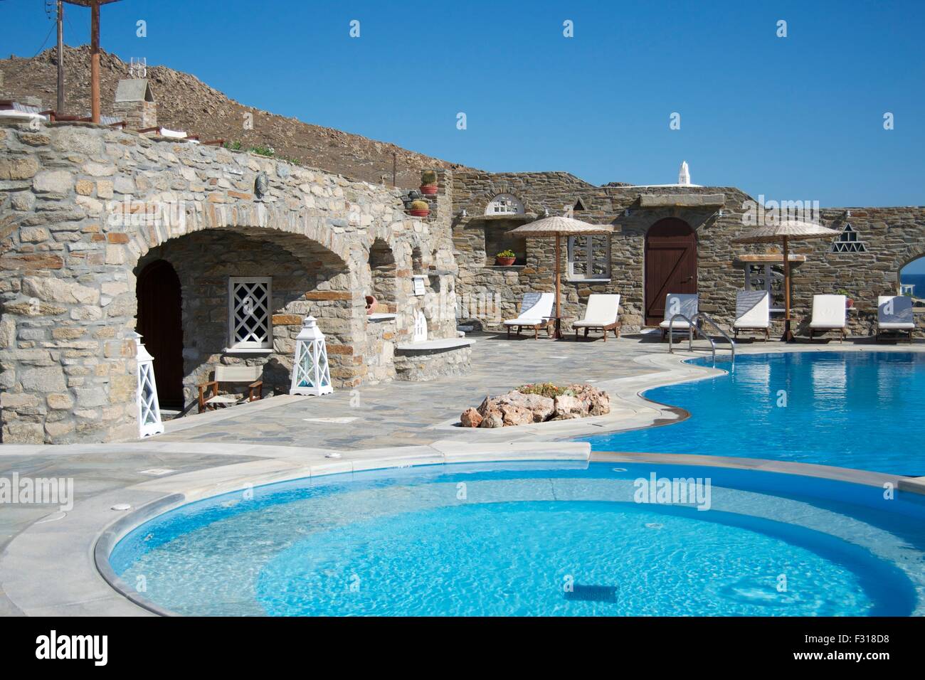 Beach facing swimming pool resort relax sea blue Stock Photo - Alamy