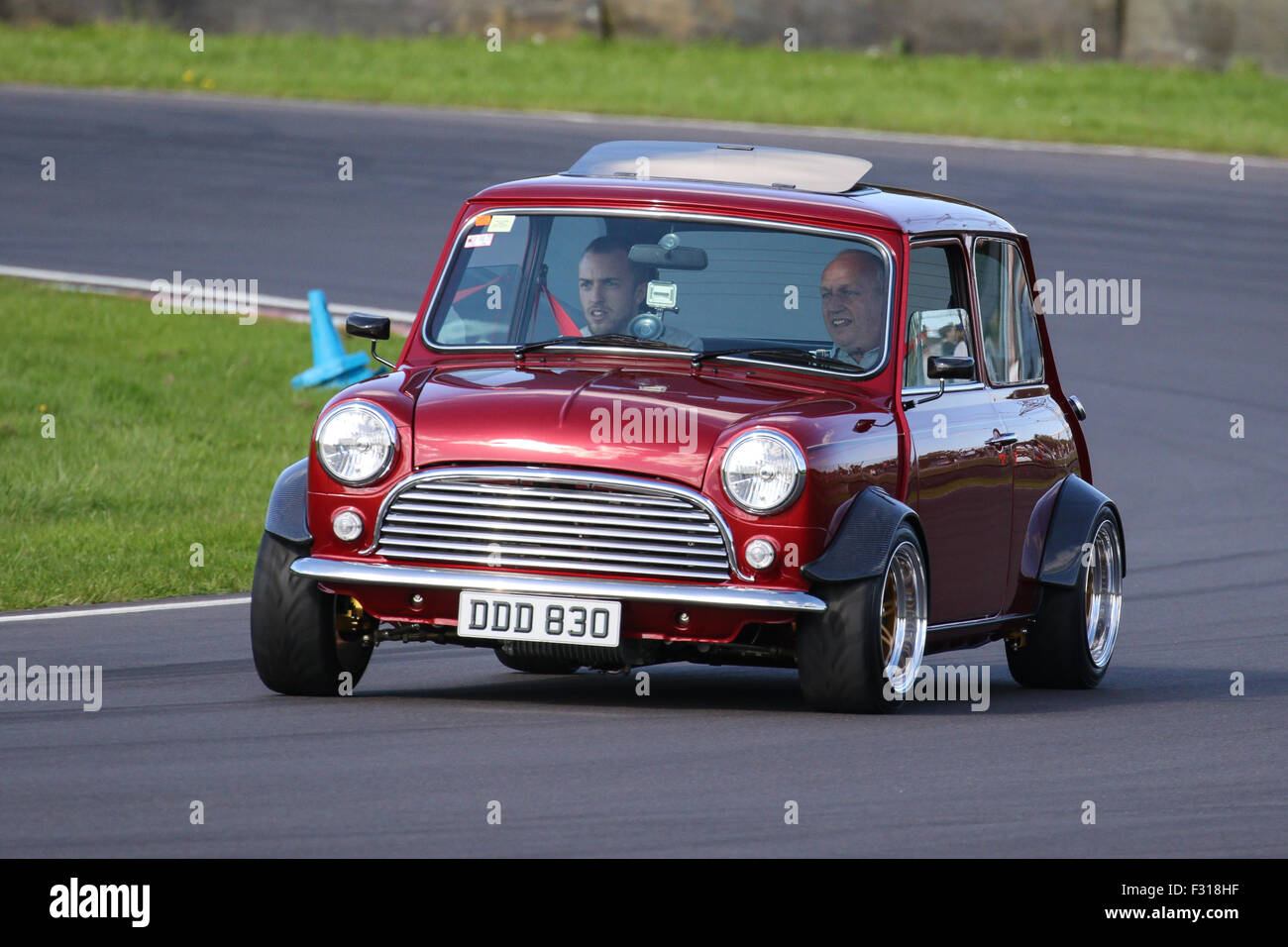 A Mini on track at Castle Combe Circuit's Mini Action Day Stock Photo ...