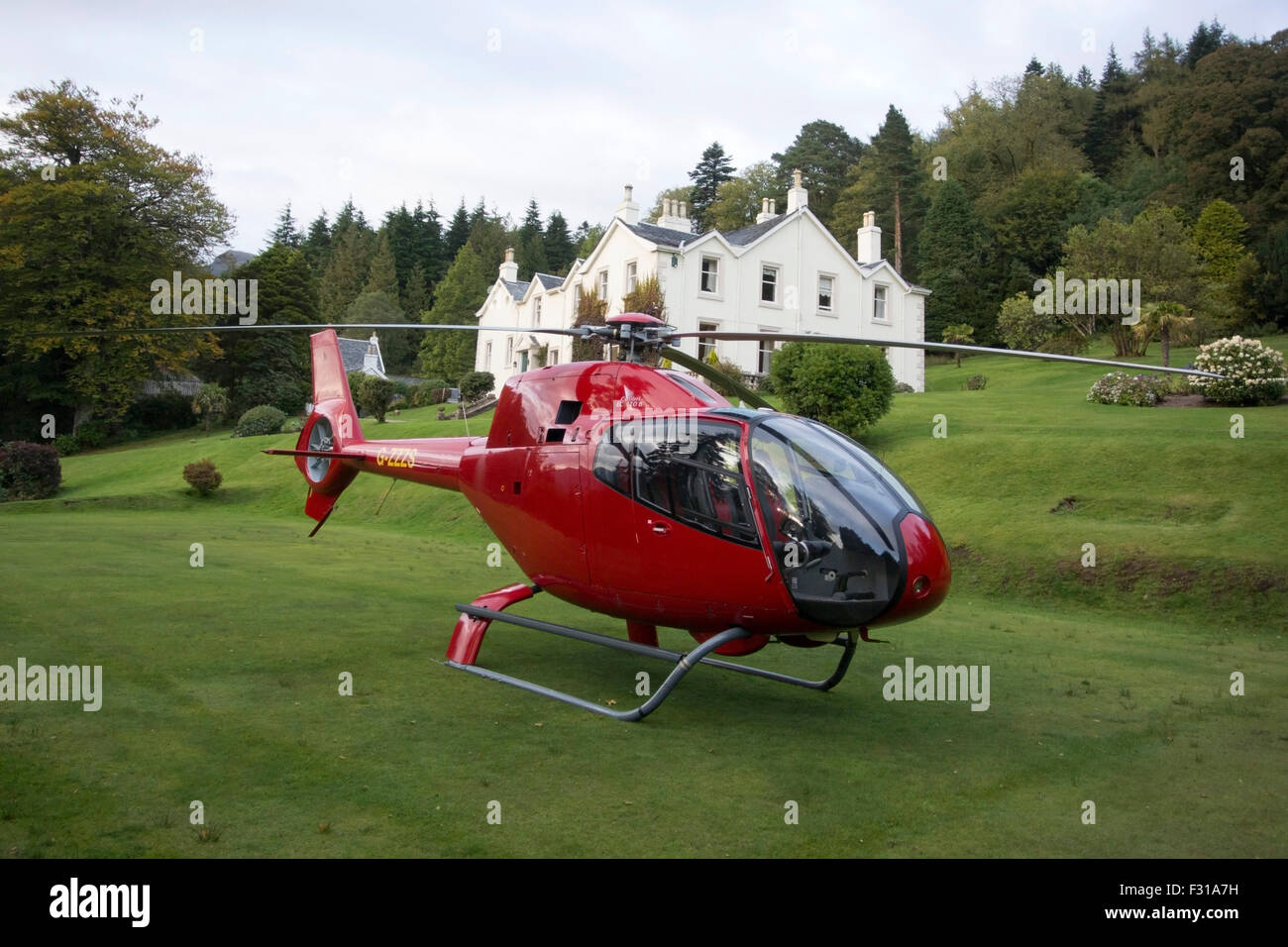 Bright Red Eurocopter EC120 B Colibri Helicopter Callsign G-ZZZS Stock ...