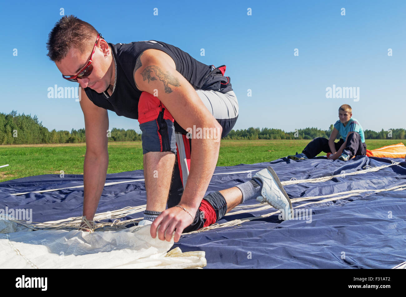 Parachutists - 2014. Packing of parachutes Stock Photo - Alamy