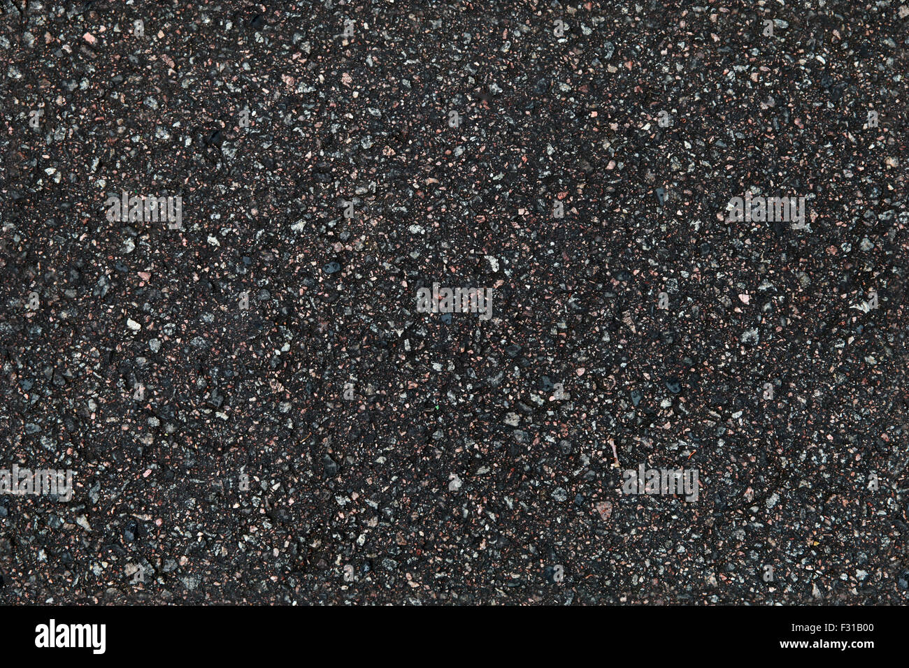 Black asphalt pavement closeup background photo texture Stock Photo - Alamy