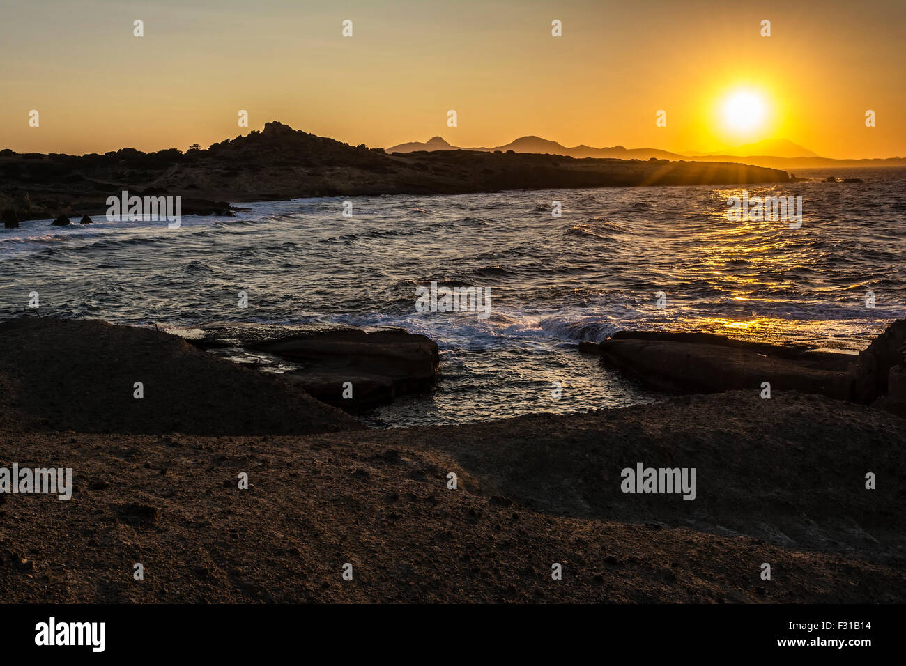 Milos cliff sunset hi-res stock photography and images - Alamy