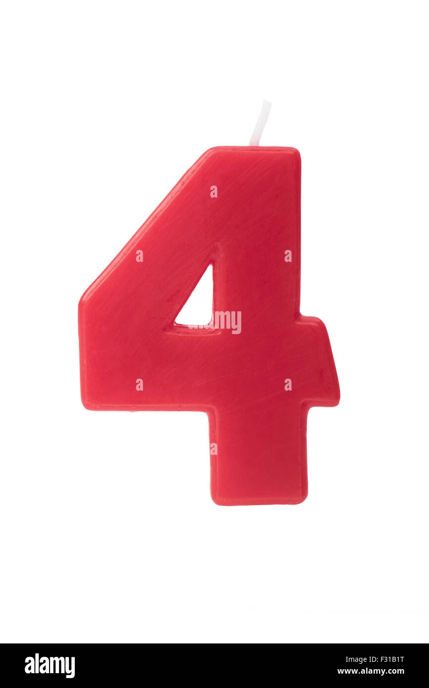 Red birthday candle in the form of the number four on white background ...