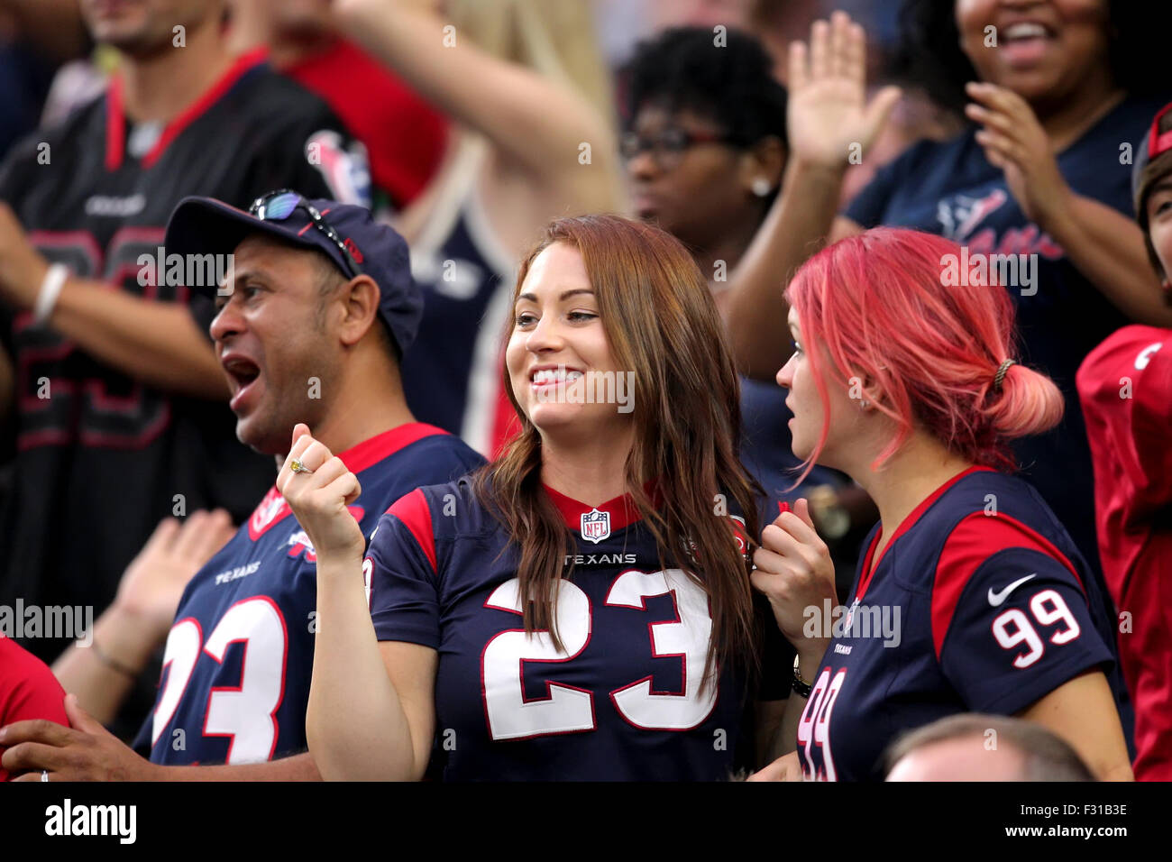 SEP 27 2015: A set of Houston Texans fans cheer from the stands during ...