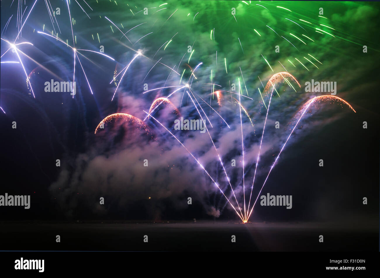 Beautiful colorful fireworks on the night sky Stock Photo - Alamy