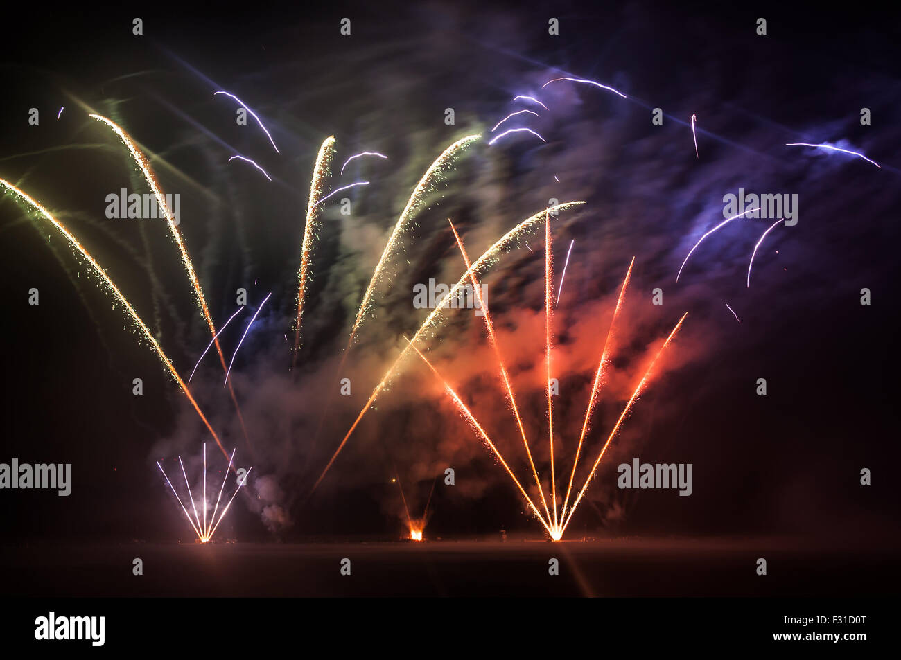 Beautiful colorful fireworks on the night sky Stock Photo - Alamy
