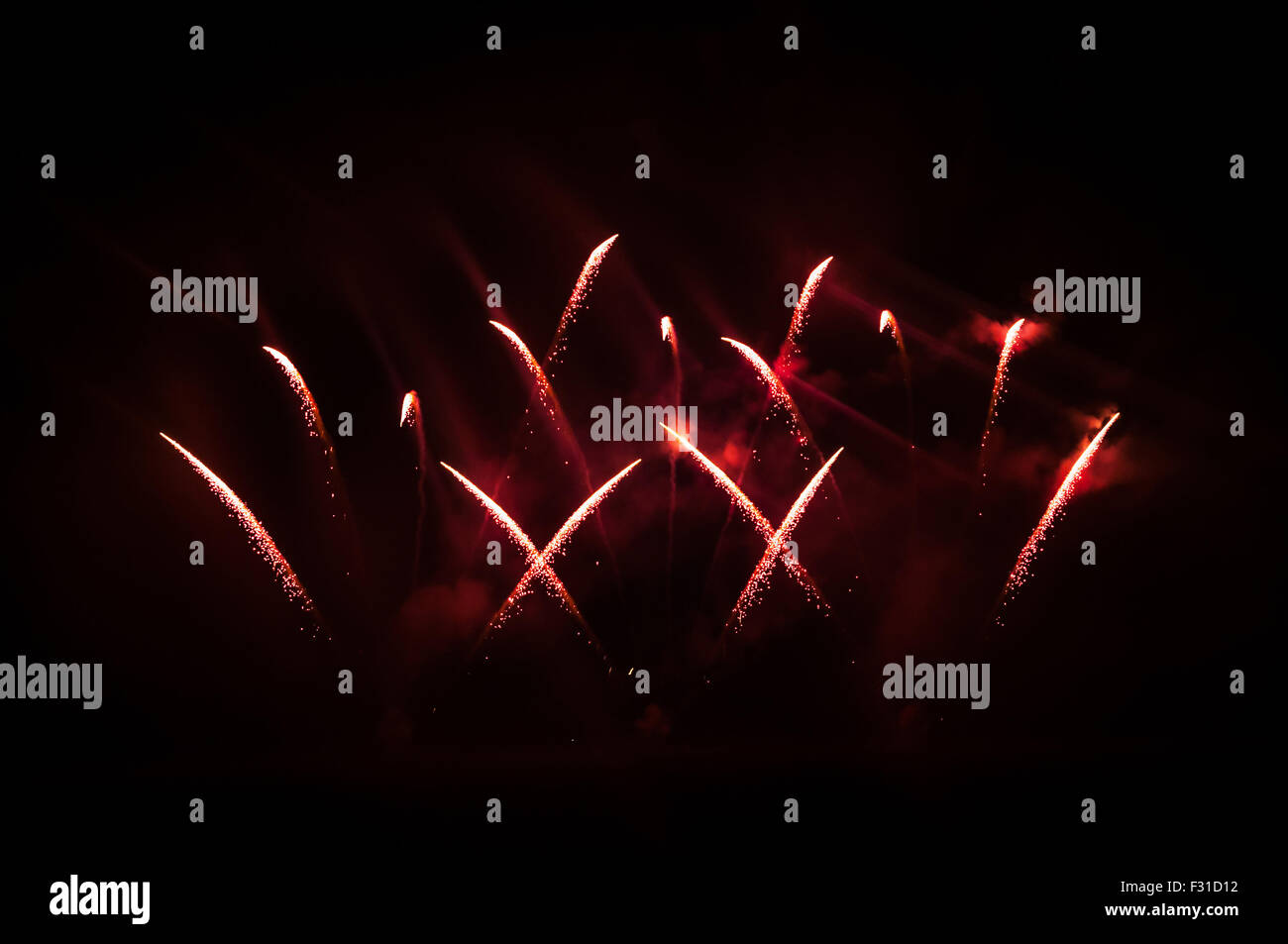 Red glowing fireworks hi-res stock photography and images - Alamy