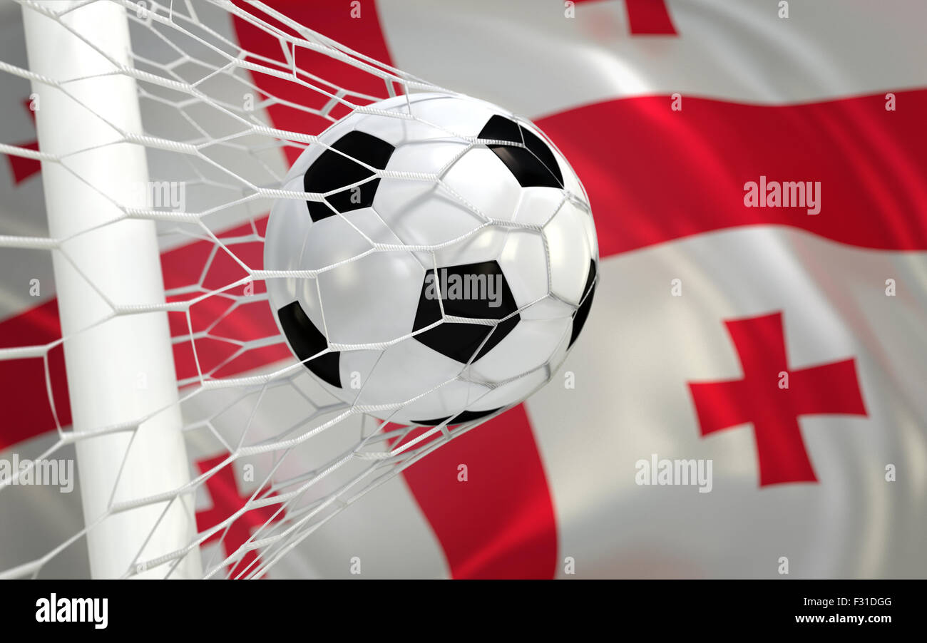 Georgia flag and soccer ball, football in goal net Stock Photo - Alamy