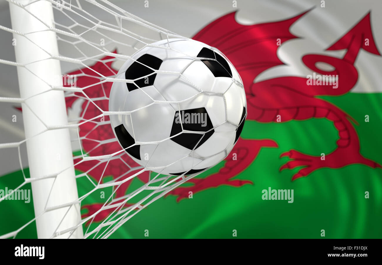 Wales flag and soccer ball, football in goal net Stock Photo - Alamy