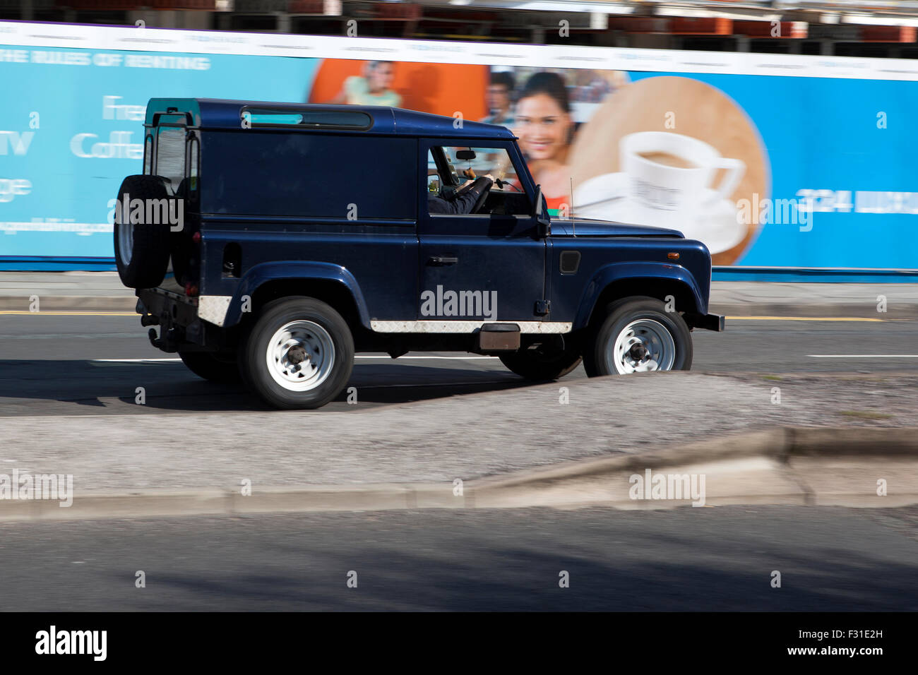 A blurred moving Land Rover Defender at speed motion blur on 'The ...