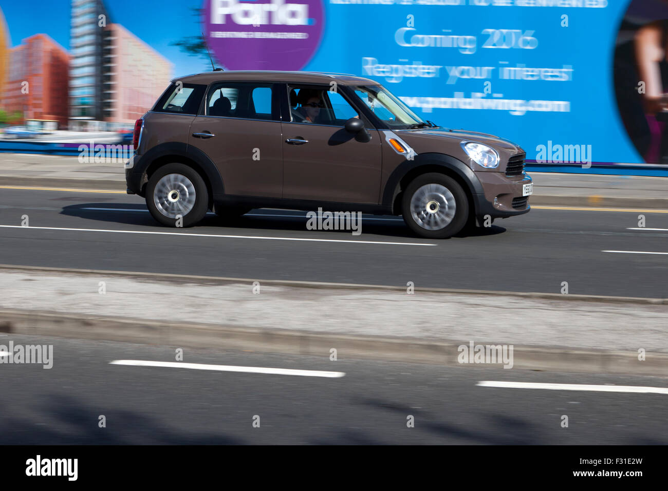 A blurred moving Mini Cooper at speed motion blur on 'The Strand' at ...