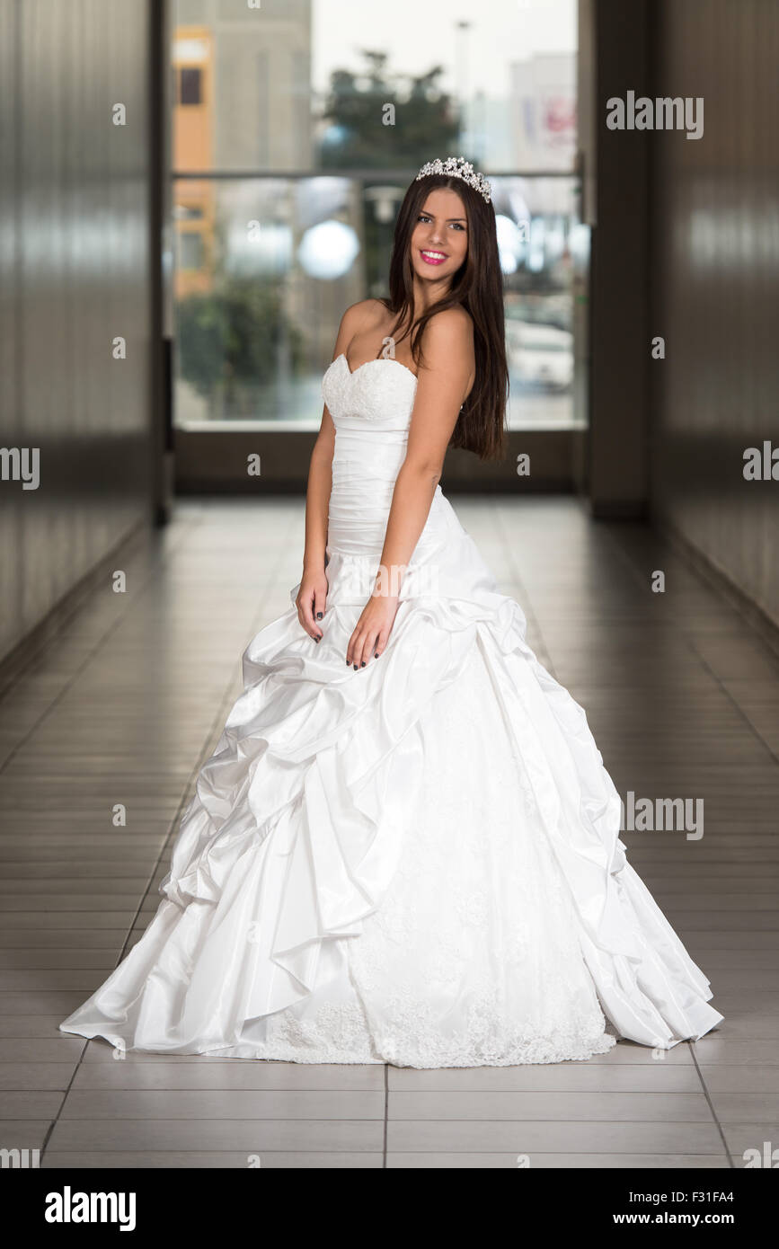 Beautiful Bride In Her Wedding Dress Stock Photo - Alamy