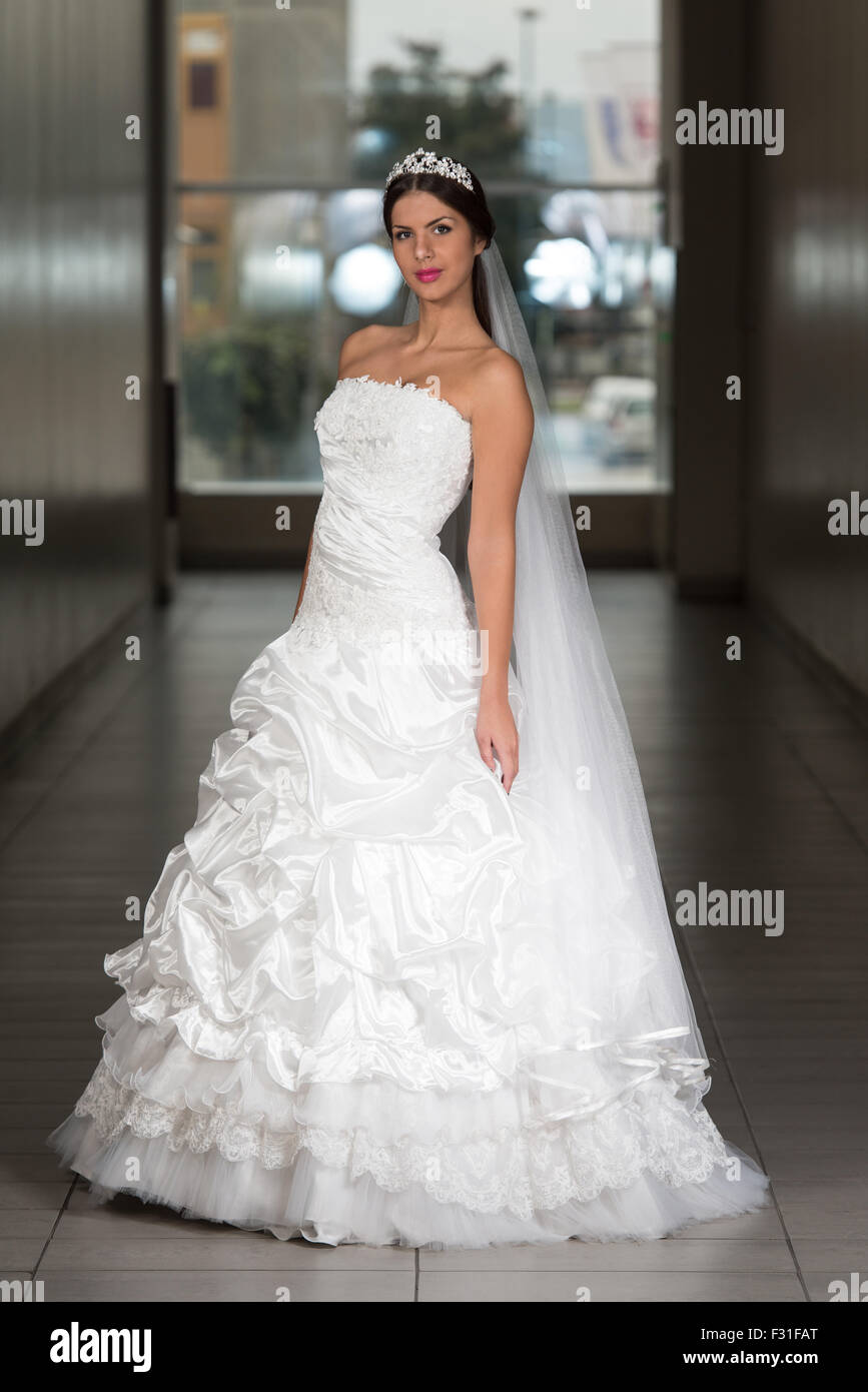 Beautiful Bride In Her Wedding Dress Stock Photo - Alamy