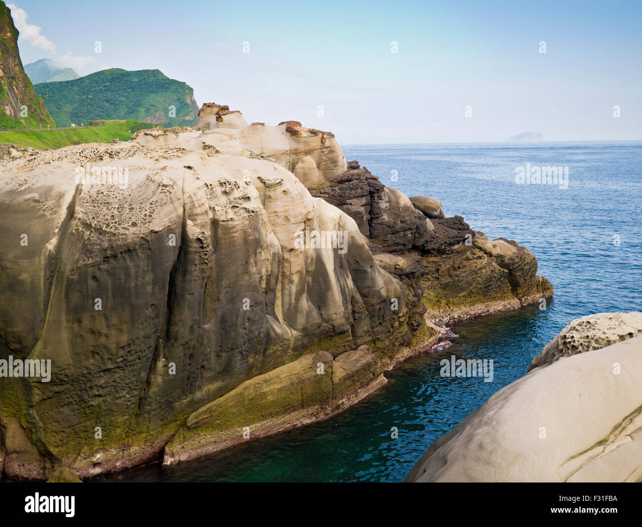 panoramic view of nice colorful huge cliff and sea on the back Stock ...