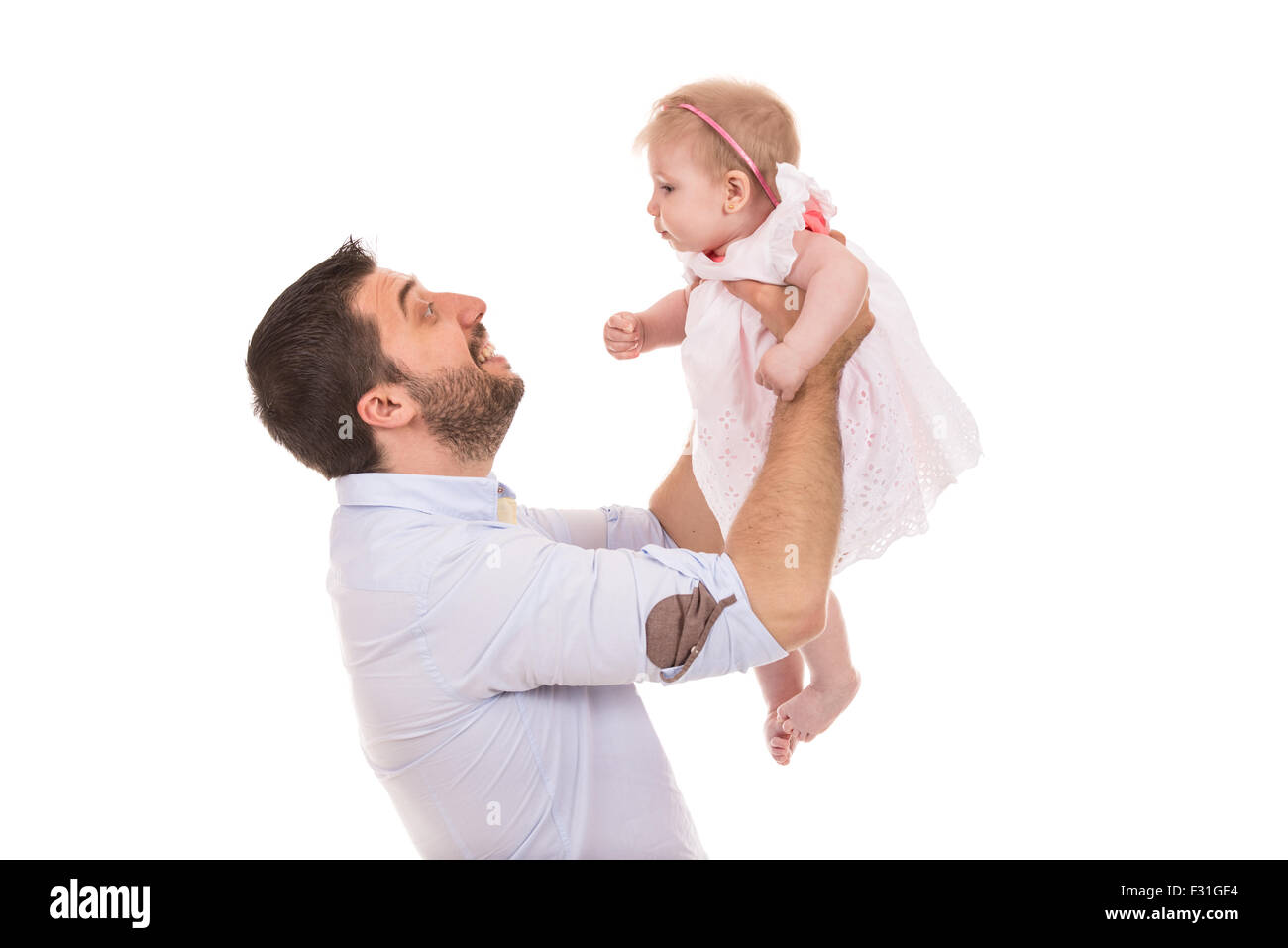 Father raising up his little baby girl isolated on white background ...