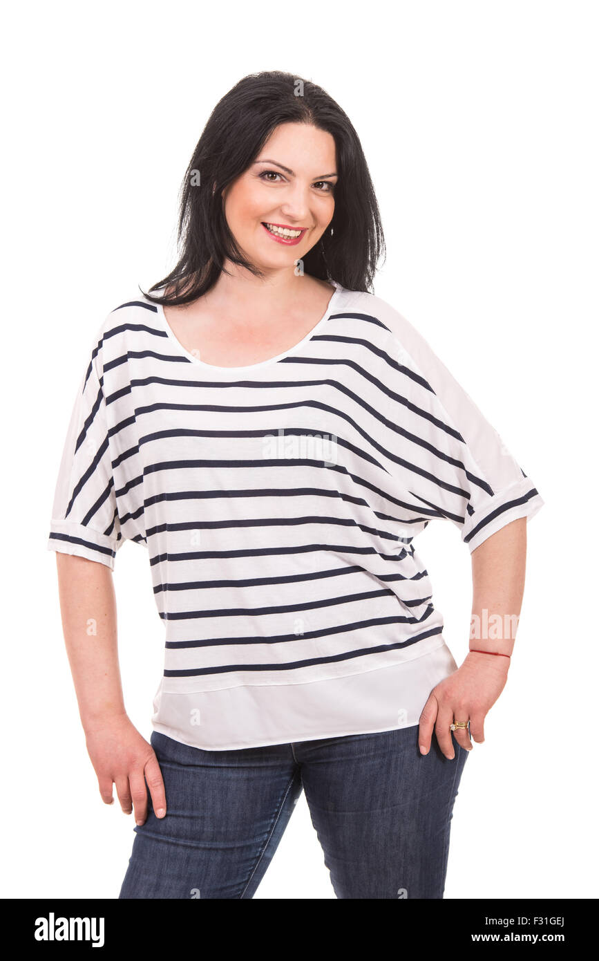 Happy model woman in casual clothes posing isolated on white background ...