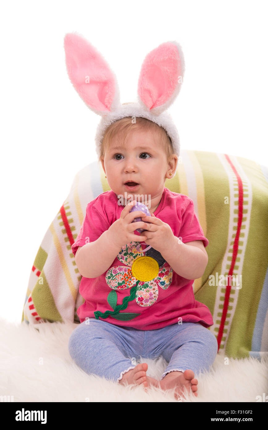 Little girl holding ears hi-res stock photography and images - Alamy