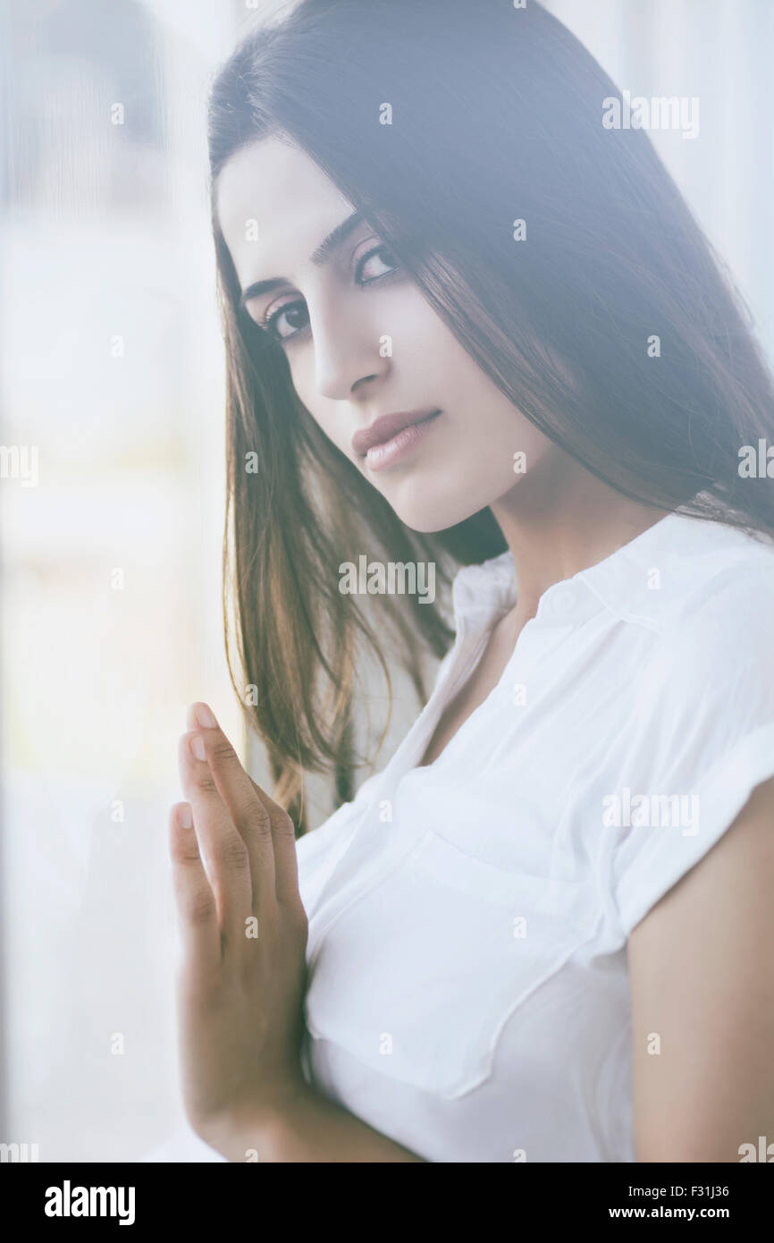 Woman Leaning Against Glass Window High Resolution Stock Photography ...