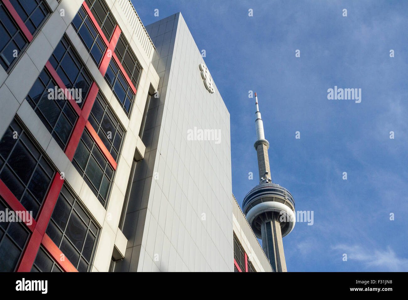 CN tower peaking above the CBC Canada building in downtown Toronto ...