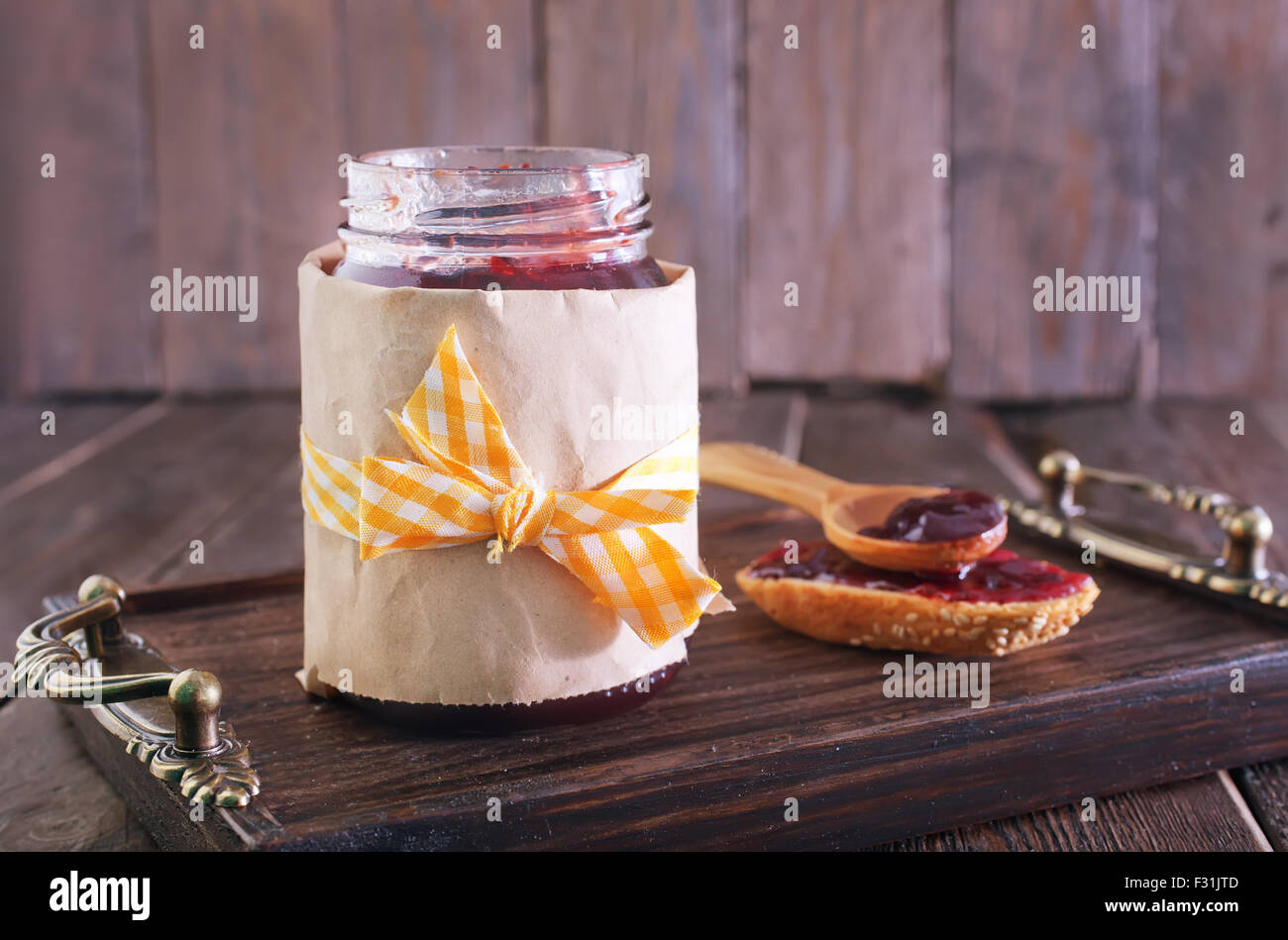 jam in glass jar and on a table Stock Photo - Alamy