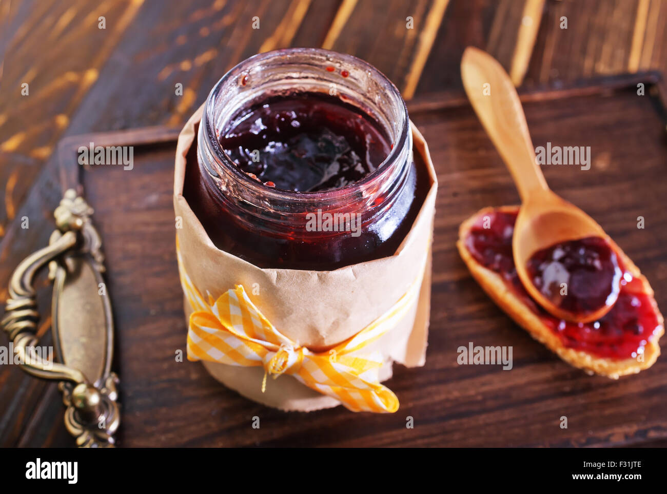 jam in glass jar and on a table Stock Photo - Alamy