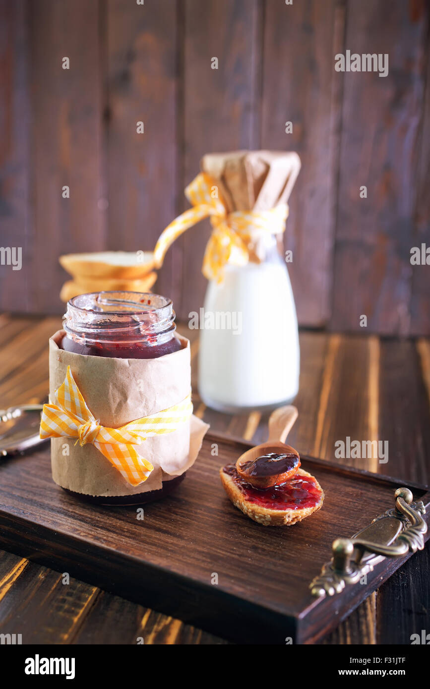 jam in glass jar and on a table Stock Photo - Alamy