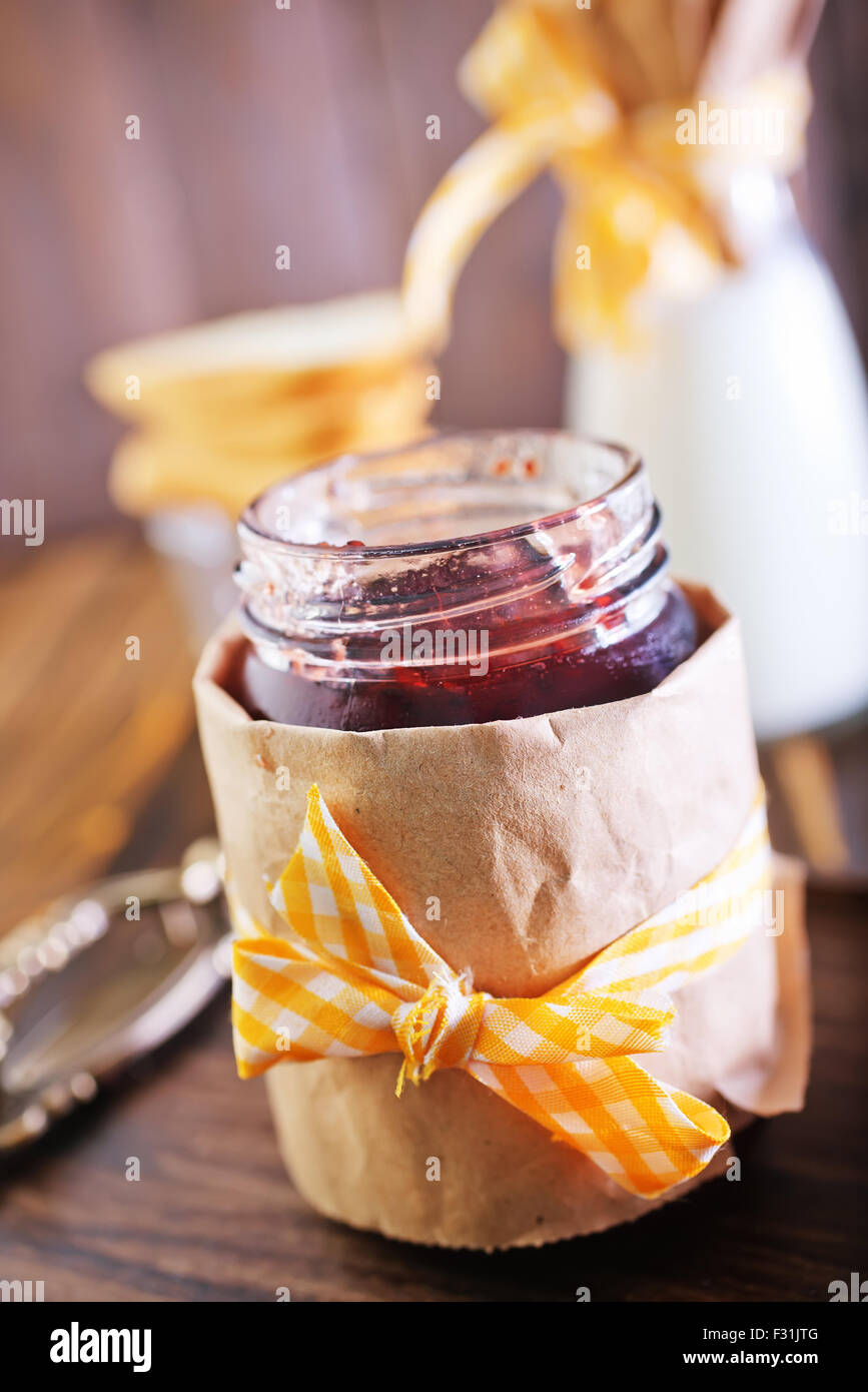 jam in glass jar and on a table Stock Photo - Alamy