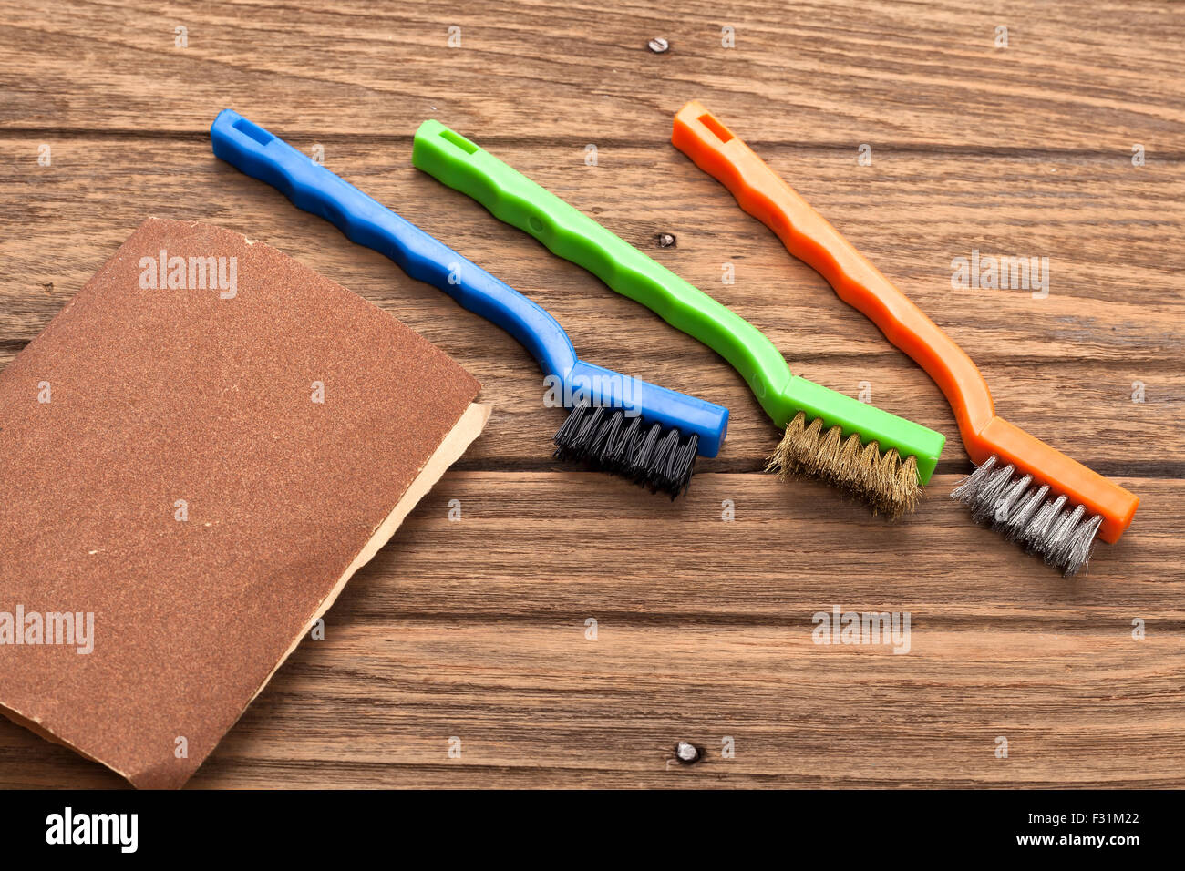 wire brush sandpaper equipment background wood teak still life vintage ...