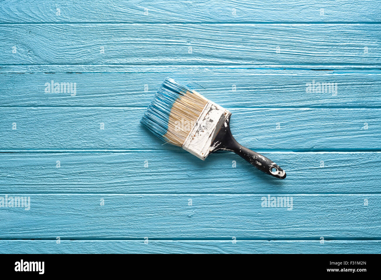 paintbrush wood coating blue tool equipment wood teak still life ...