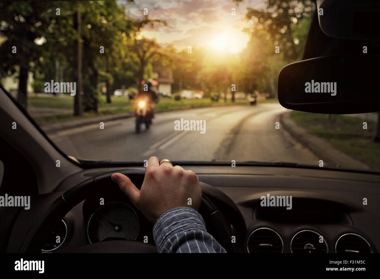 Driving the car around town Stock Photo - Alamy