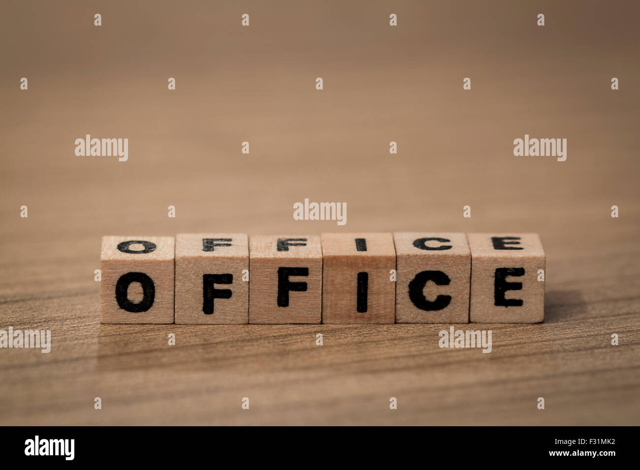 Office written in wooden cubes on a desk Stock Photo - Alamy