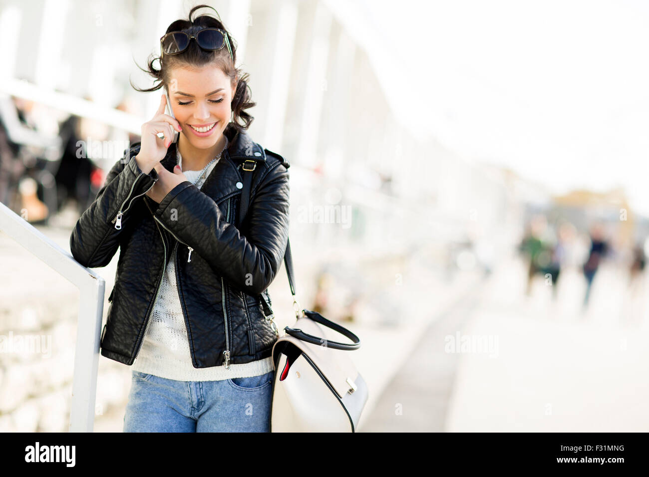 Pretty young woman outdoor Stock Photo - Alamy